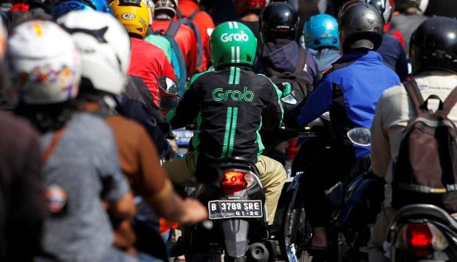 With recovery hinging on drivers, Grab and Gojek burn cash to extend ...