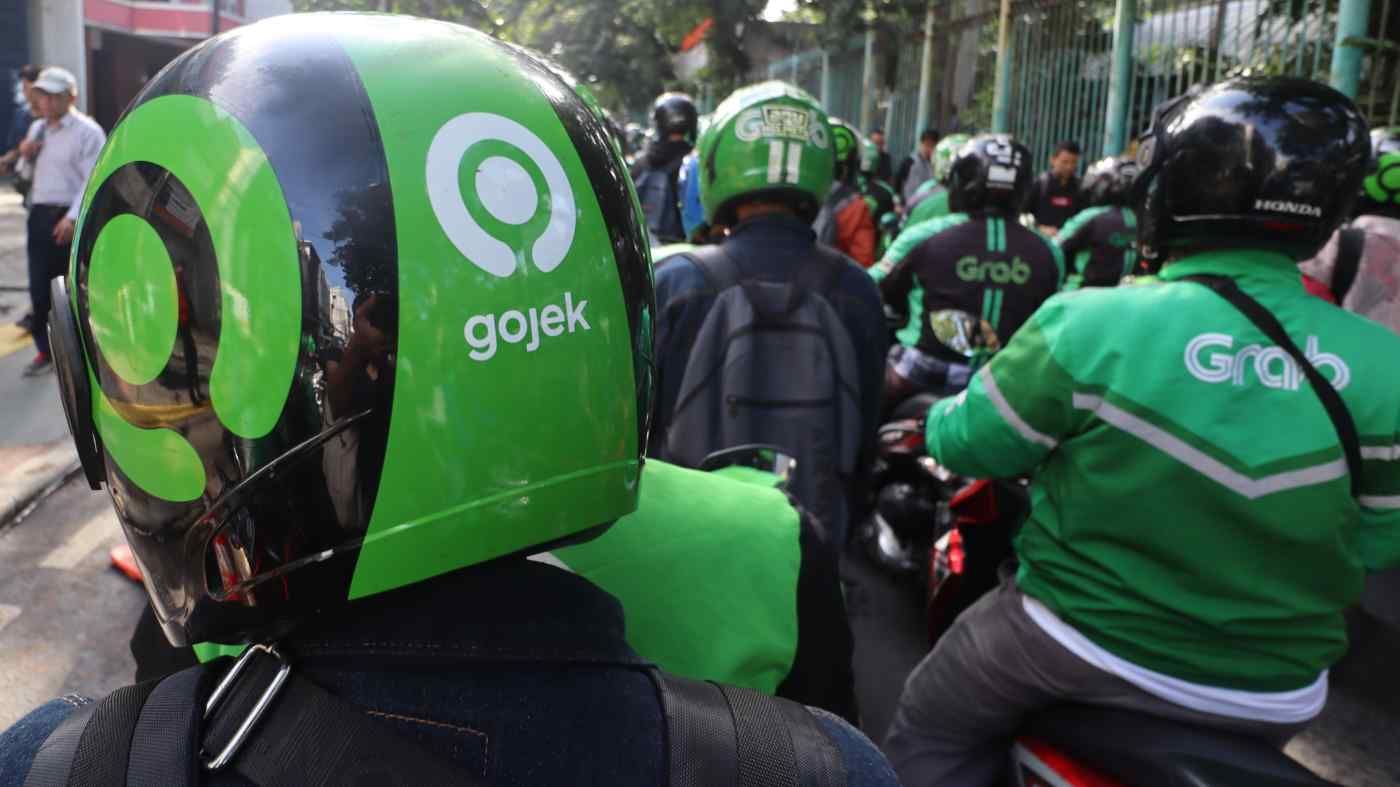 Ride-hailing giants Grab, Gojek commit to 'carbon zero' ahead of public ...